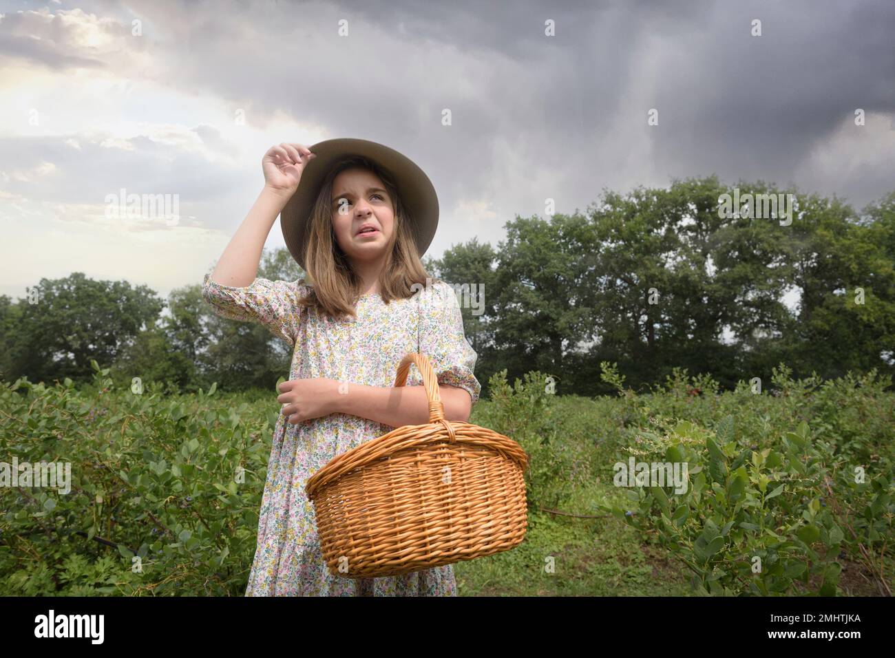 Response to weather changes in summer. Teenage girl and unexpected rain ...