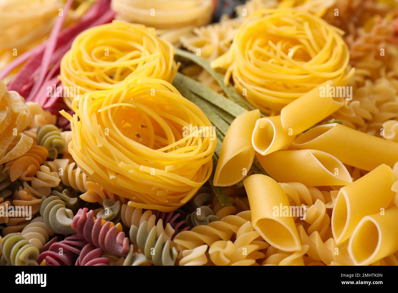 Different types of pasta as background, closeup Stock Photo - Alamy