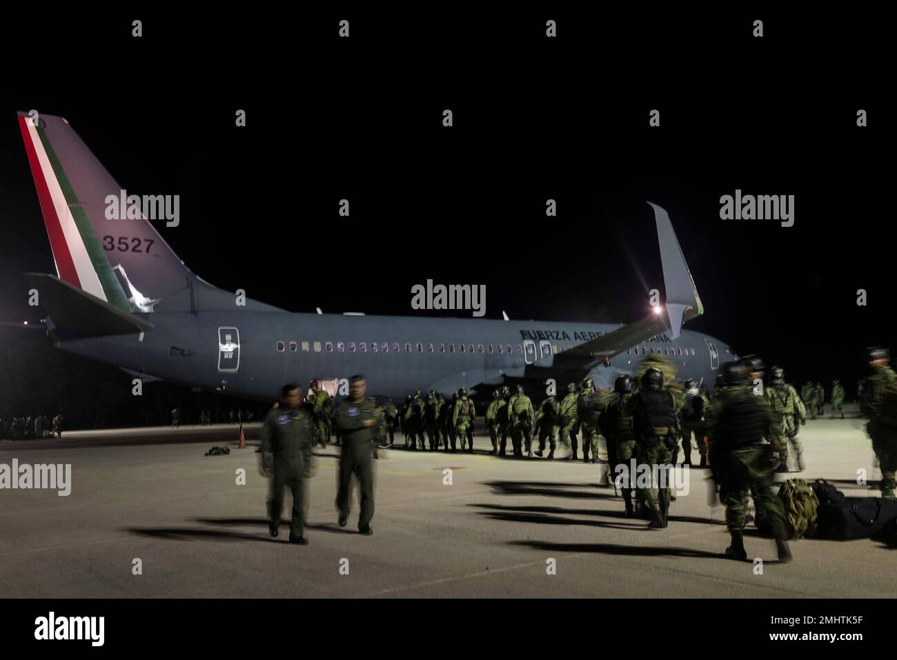 Mexican troops arrive at a military base in Culiacan, Mexico, Friday ...