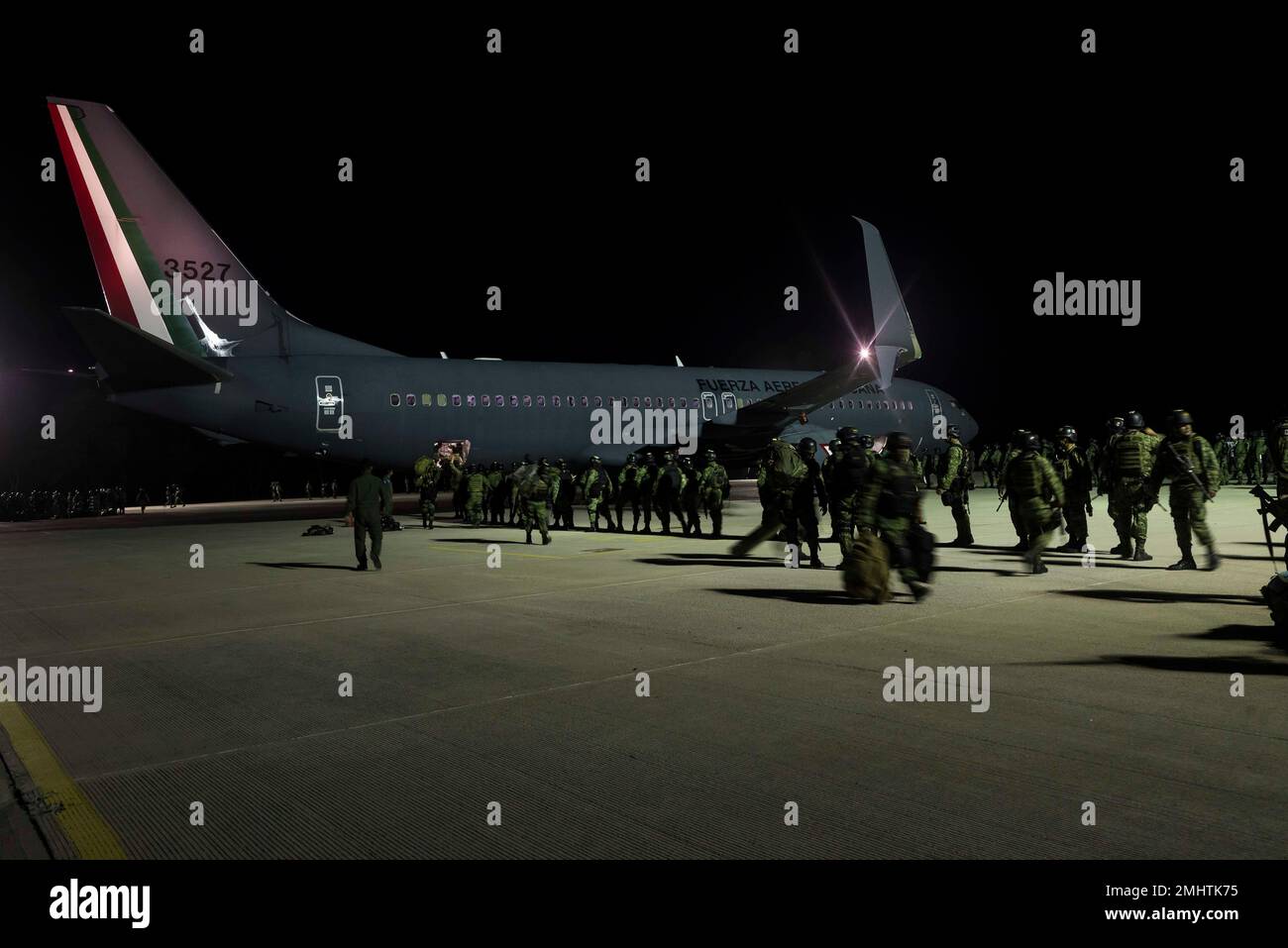Mexican troops arrive at a military base in Culiacan, Mexico, Friday ...