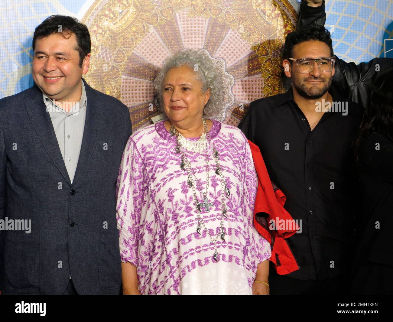 Mexican author Laura Esquivel, center, poses for a photo on the red ...