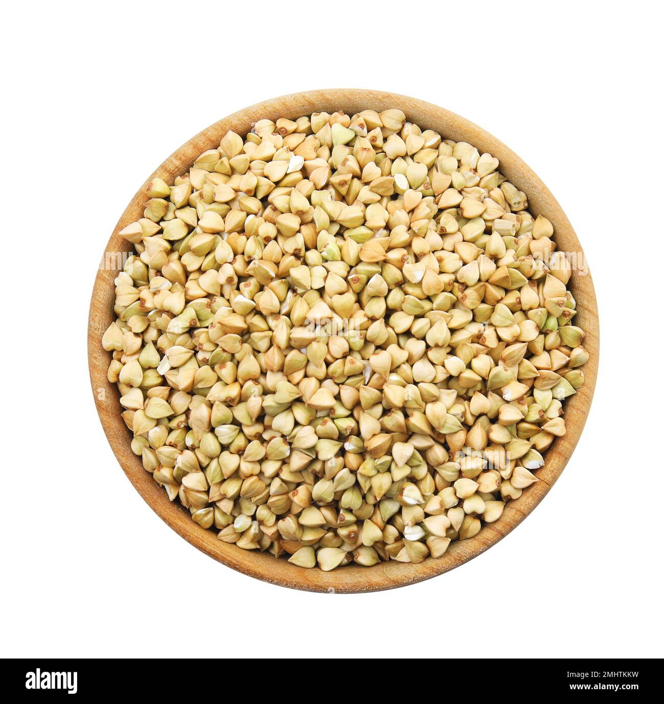 Uncooked green buckwheat grains in bowl isolated on white, top view ...