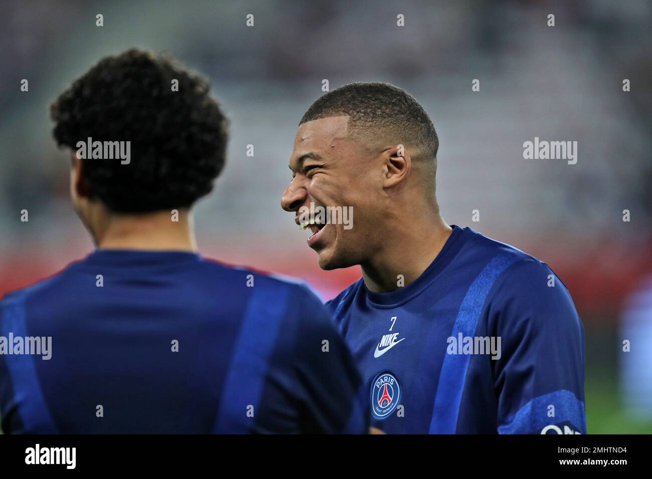 PSG's Kylian Mbappe smiles ahead of the French League One soccer match ...