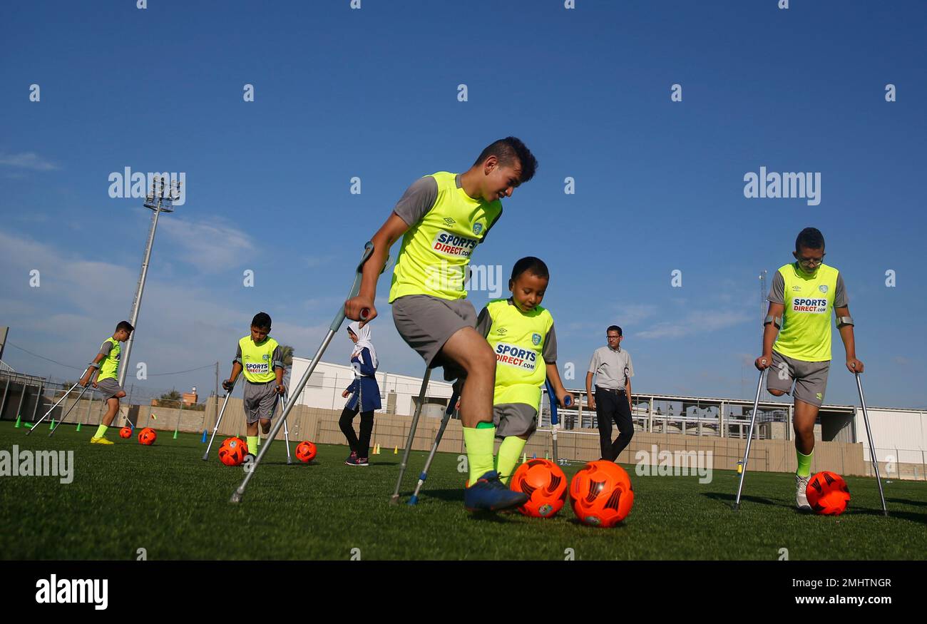 Palestinian amputee children play a soccer match at al-Durra play field ...