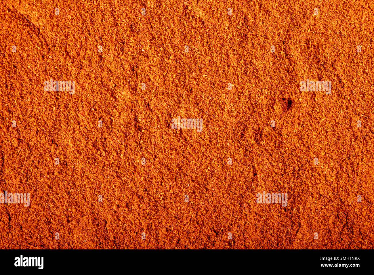 Red chili powder spice. Heaps of ground sweet ground pepper spice. Dry ...