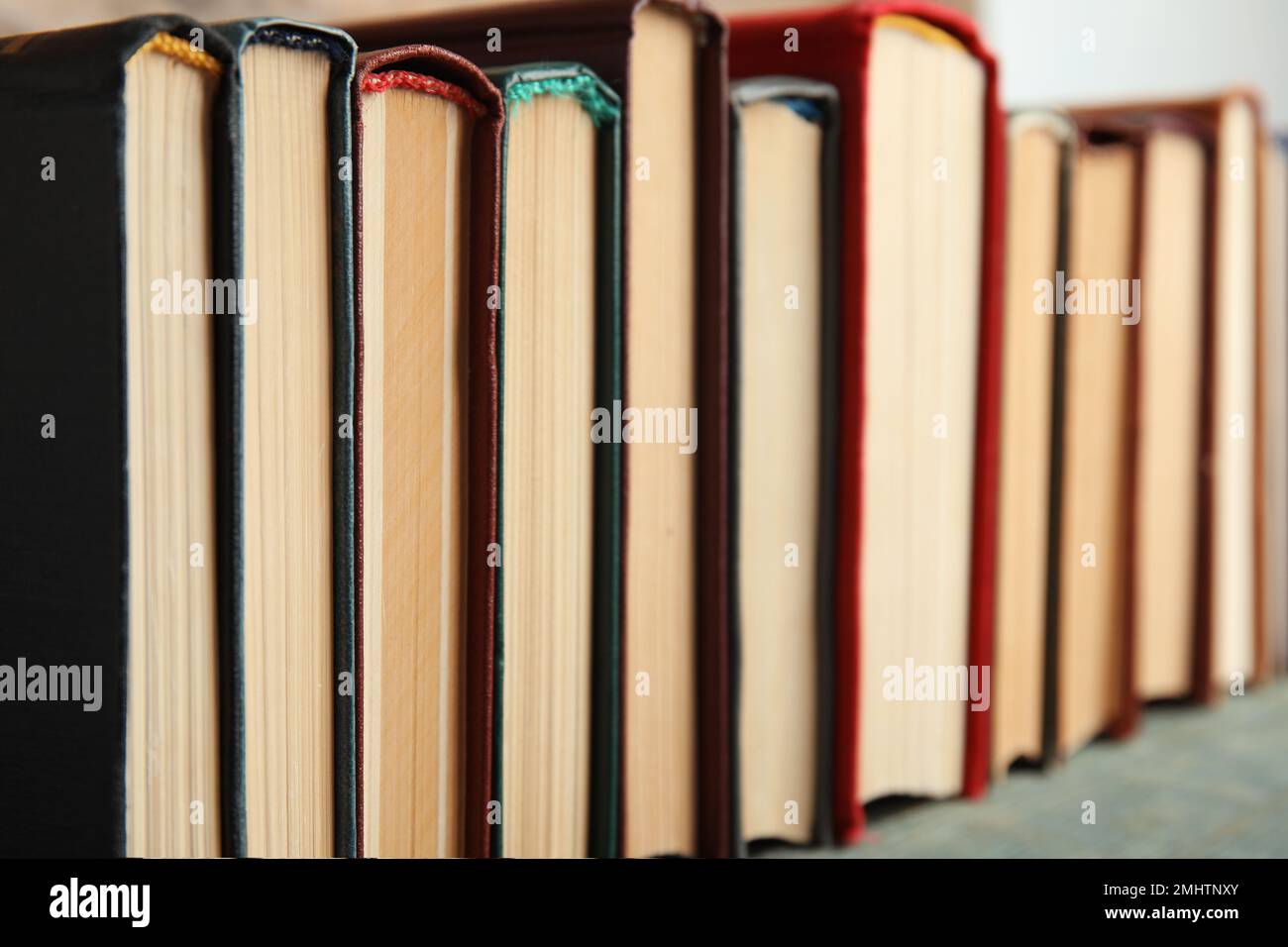Collection of old books on shelf, closeup Stock Photo - Alamy