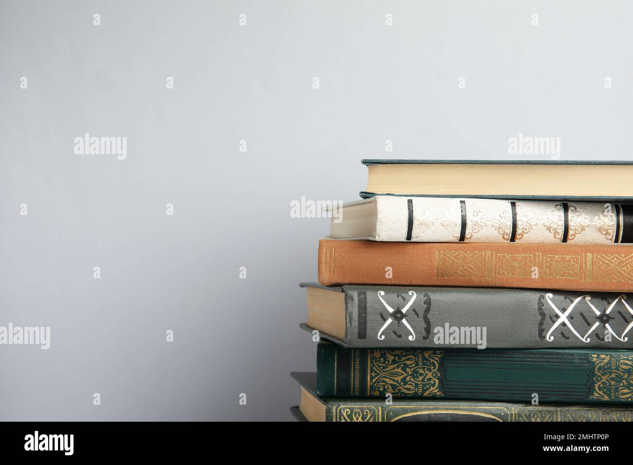 Collection of old books on light background, space for text Stock Photo ...