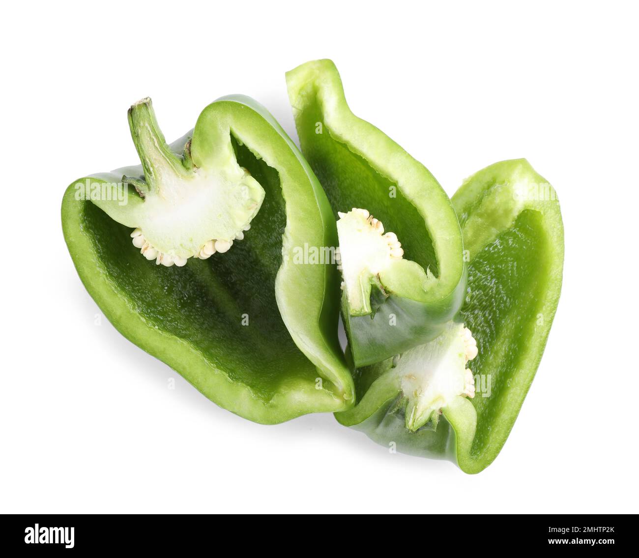 Cut green bell pepper isolated on white, top view Stock Photo - Alamy