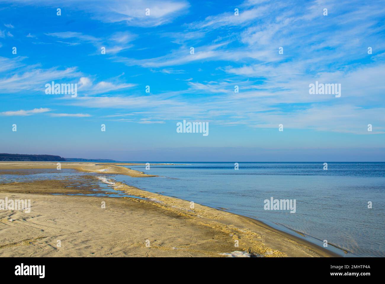 Snowy landscape at sea bay with sandy beach hi-res stock photography ...