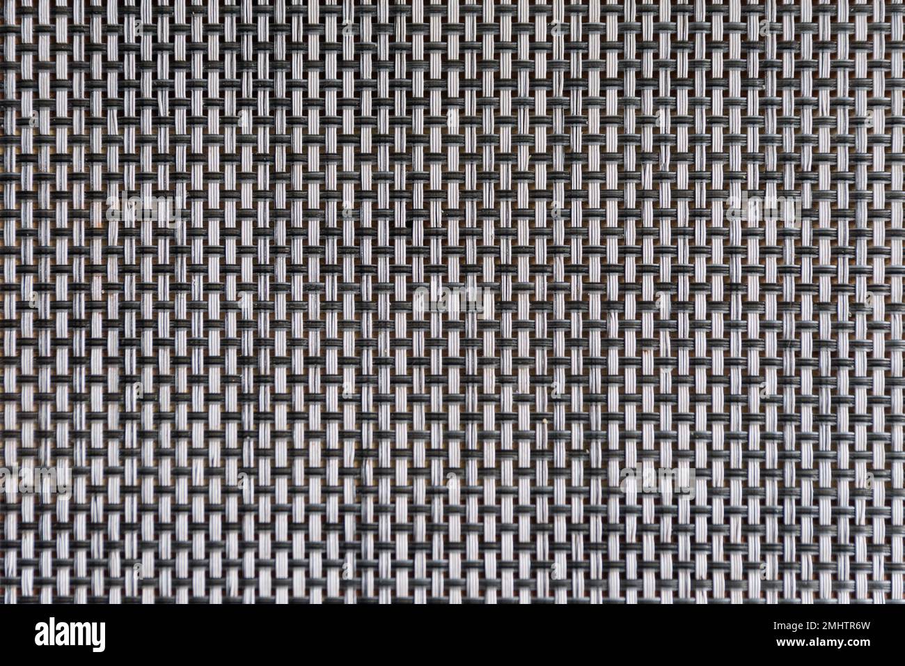 The texture of weaving plastic products. Light and dark plastic bars ...