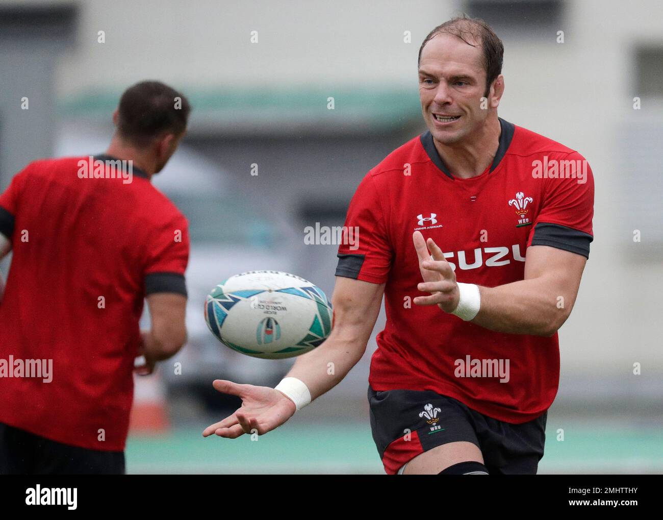 Wales rugby team captain Alun Wyn Jones passes the ball during training ...