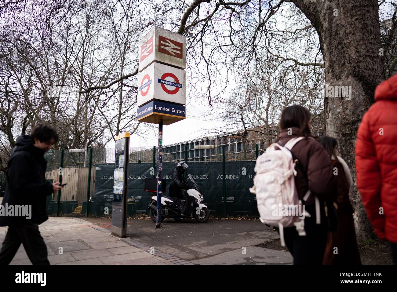 A sign for rail and underground services at London Euston station near ...