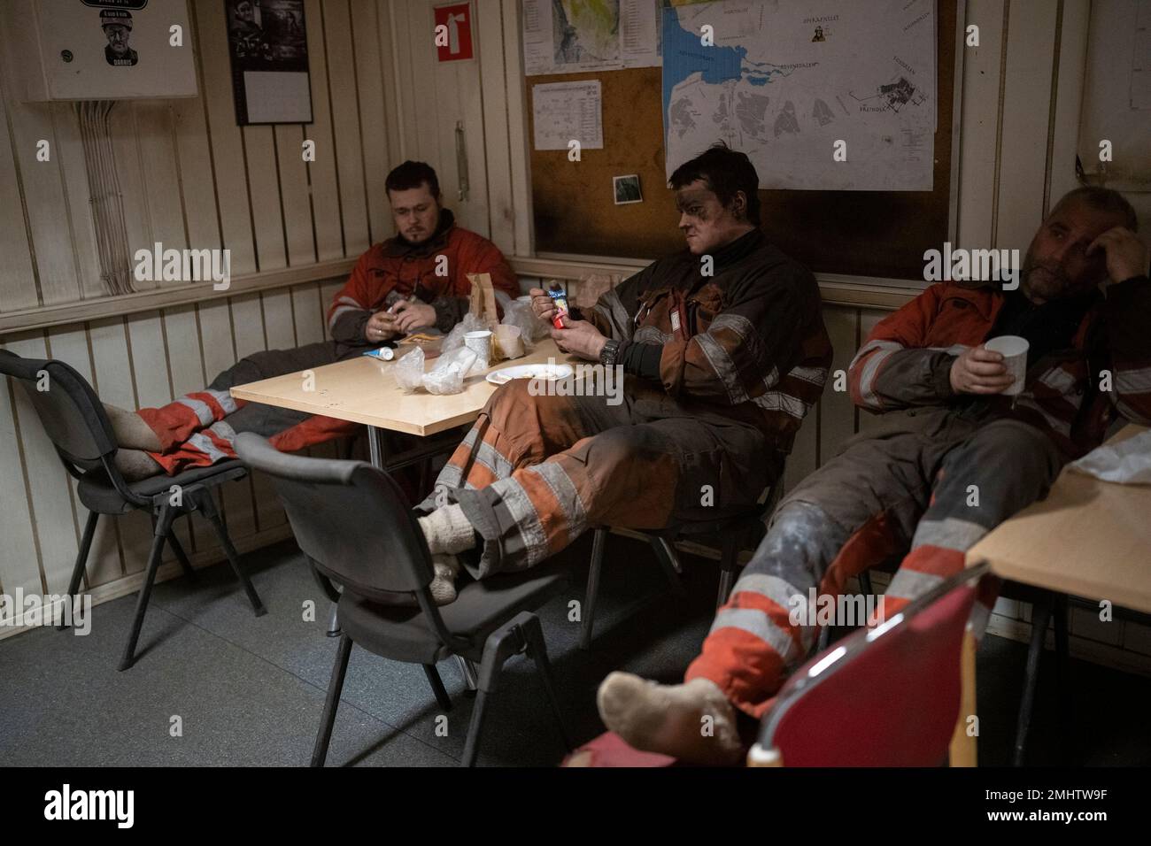 Coal miners rest during a shift in the break room of the Gruve 7 coal ...