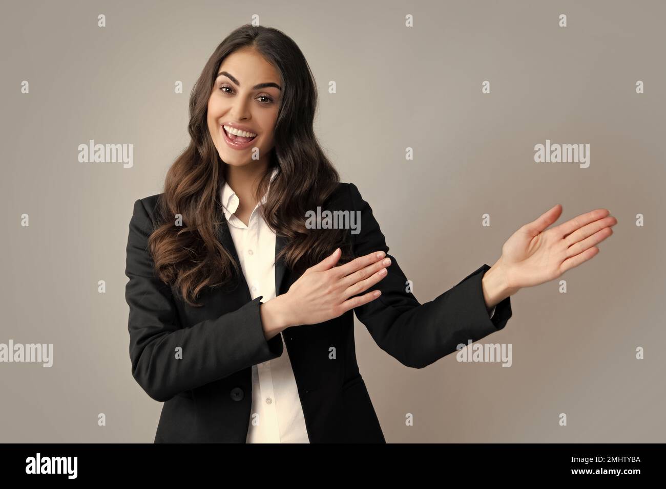 Woman point at copy space, showing copyspace pointing. Promo, girl ...