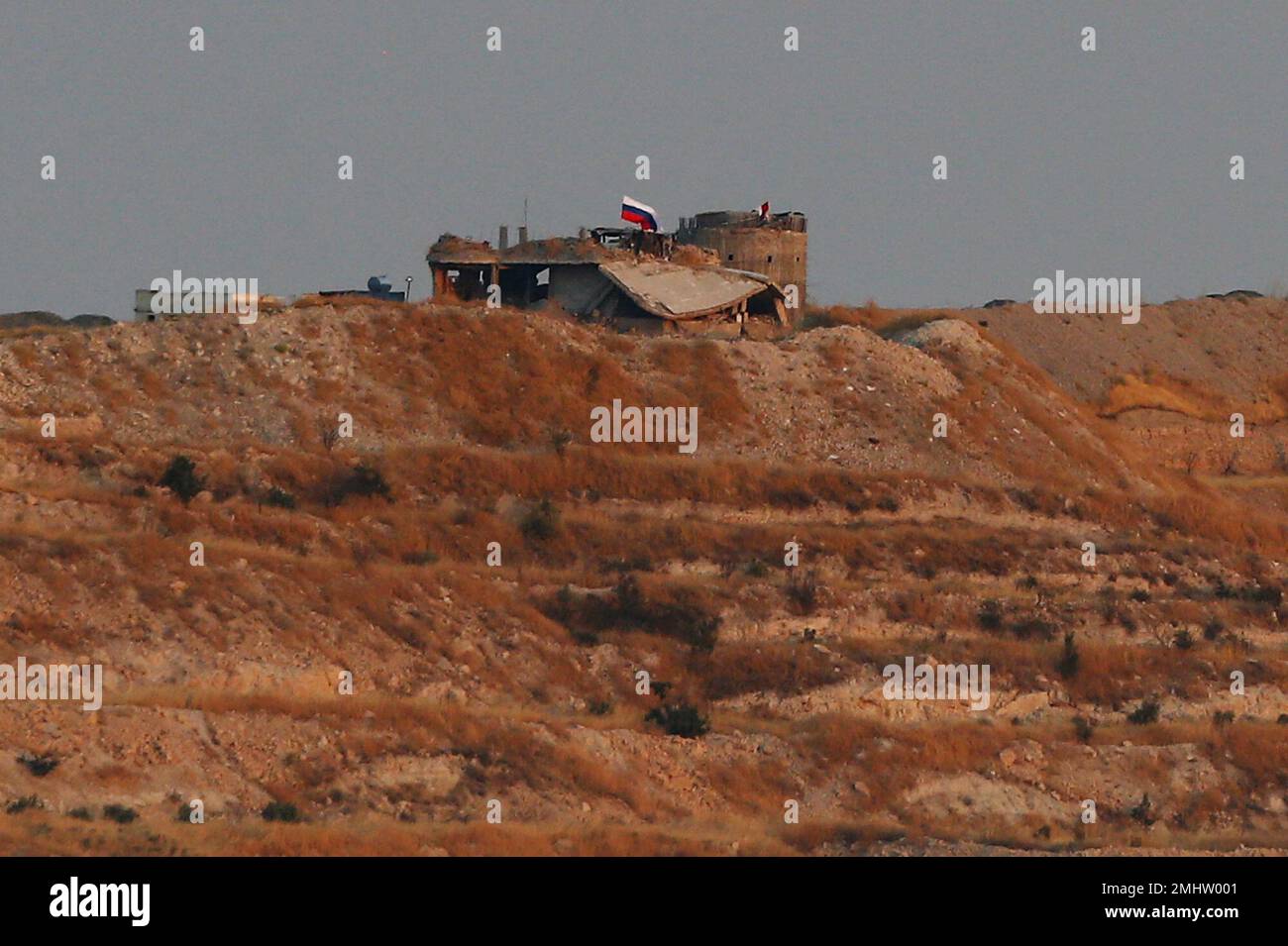 In this photo taken from the Turkish side of the border between Turkey ...