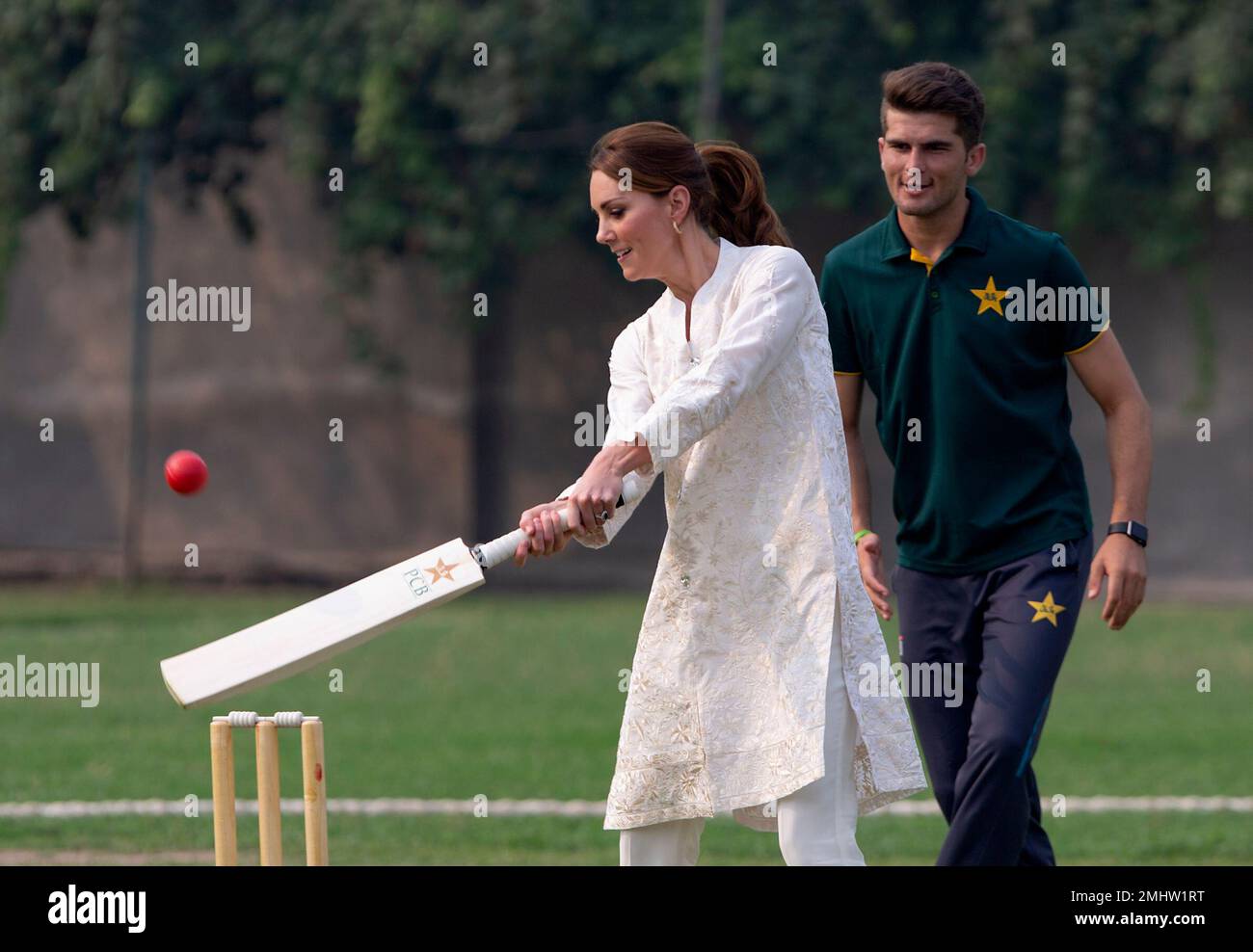 Britain's Kate, Duchess of Cambridge plays cricket as Pakistani bowler ...