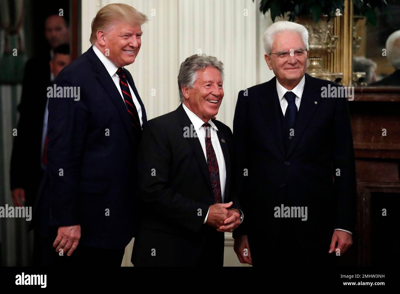 President Donald Trump and Italian President Sergio Mattarella stand ...