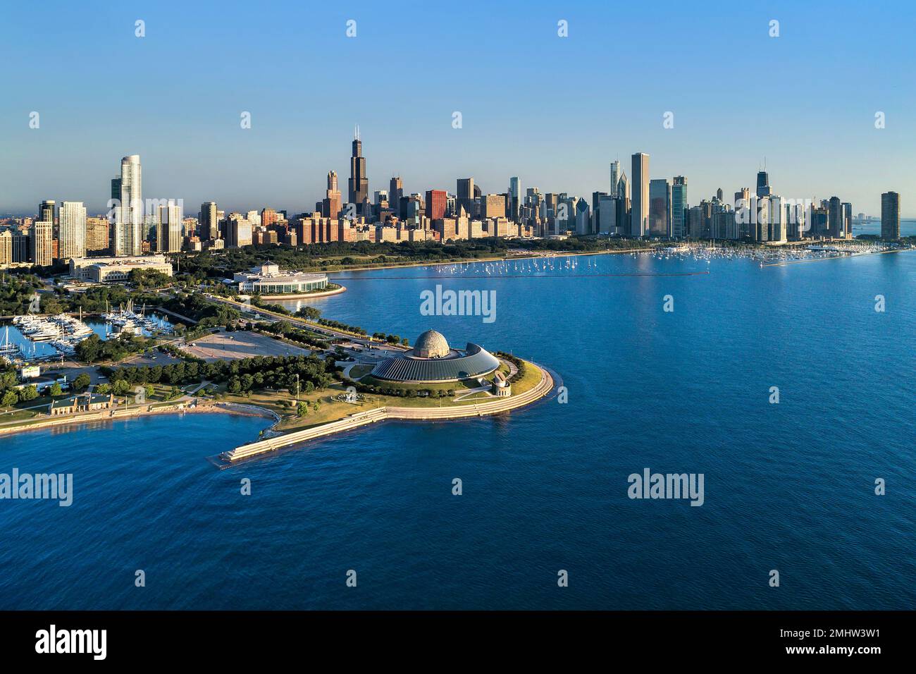 Aerial view of Monroe Harbor with the Adler Planetarium and the Shedd ...