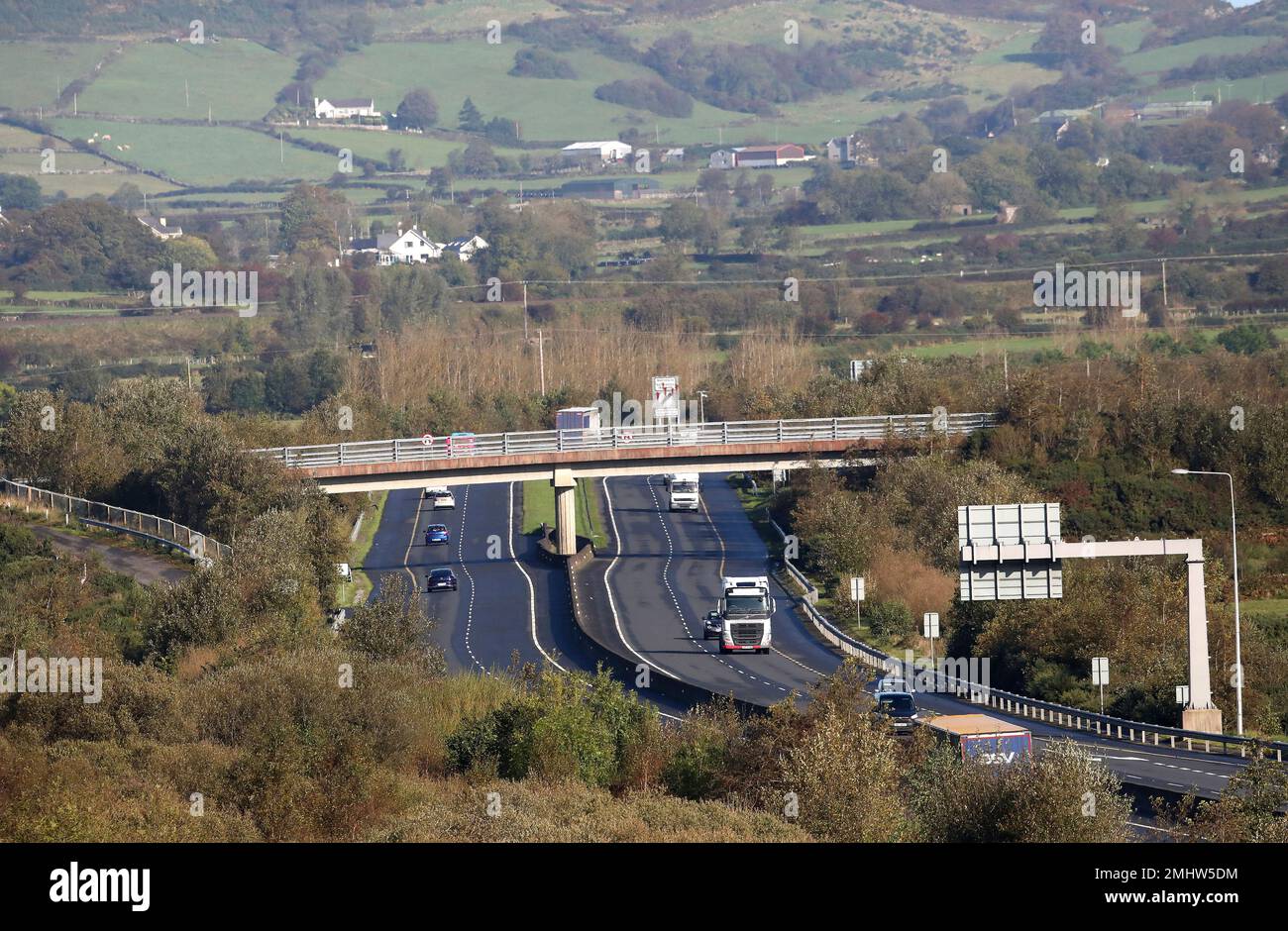 Motorists on the M1 motorway crossing the Irish border near the town of ...