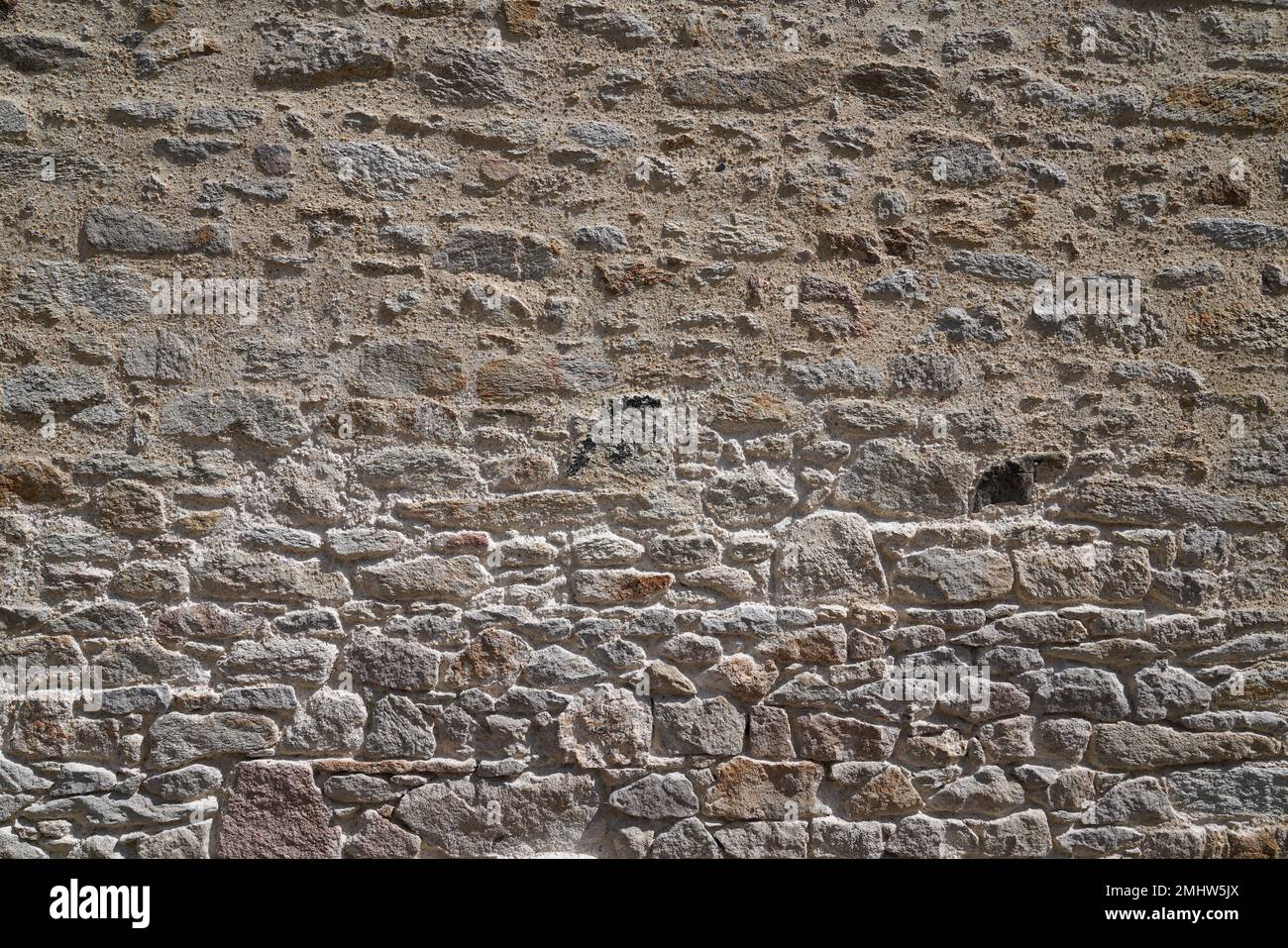 background stone hands made wall facade wall stones Stock Photo - Alamy