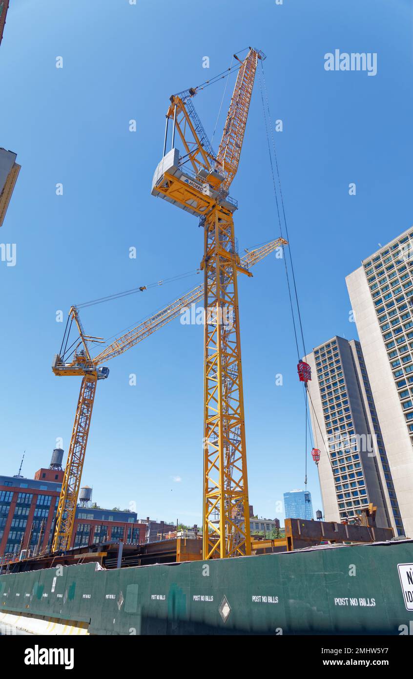 Morrow Equipment Company luffing boom cranes tower over site of 181 ...