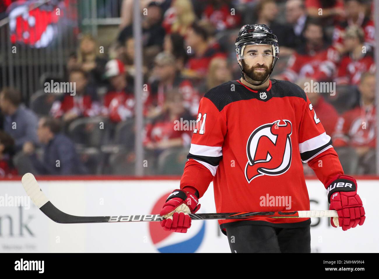 New Jersey Devils center Kyle Palmieri lines up for a face-off during ...