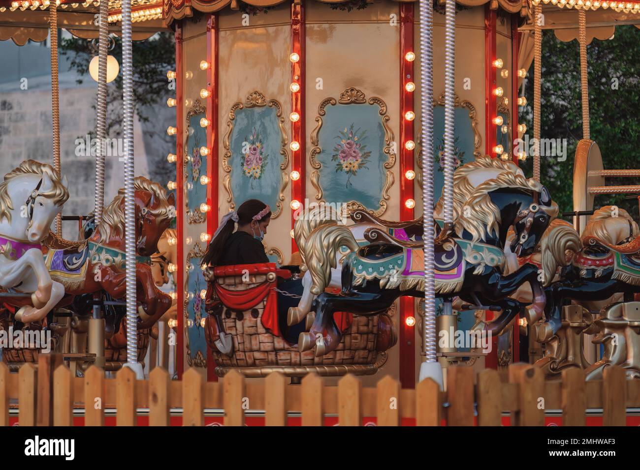 Woman riding horse on carousel hi-res stock photography and images - Alamy