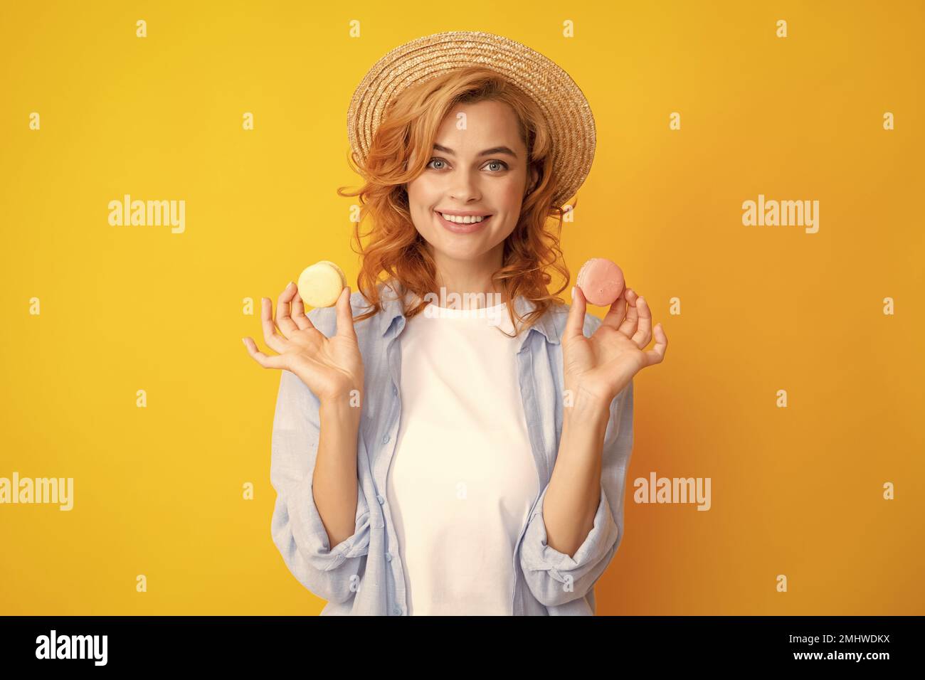 Cute young woman hold macaroon. Diet, dieting concept. Beautiful ...