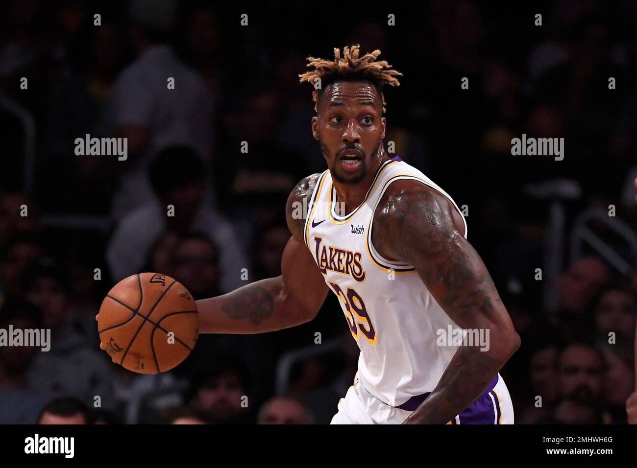 Los Angeles Lakers center Dwight Howard dribbles during the first half ...