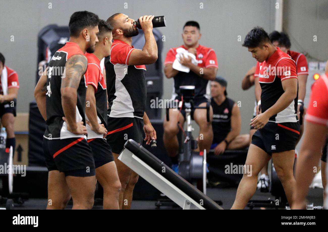 Japan captain Michael Leitch takes a drink during a gym session in ...