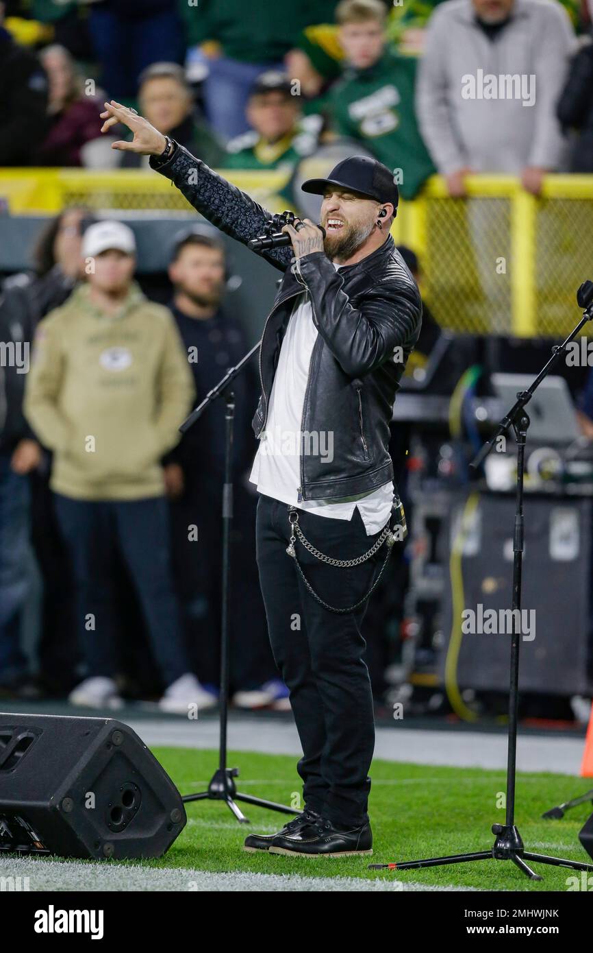 Brantley Gilbert performs during halftime of an NFL football game ...