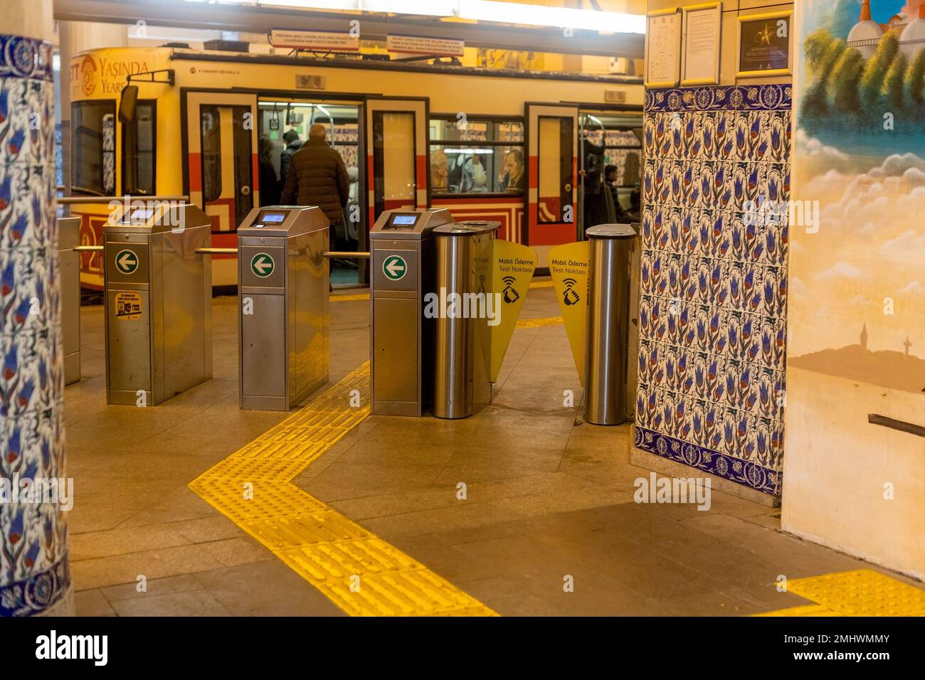 Entrance through the turnstile at the subway in Istanbul, Turkey ...