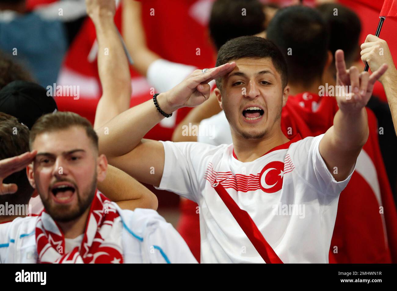 Turkish soccer team supporters shout slogans and salute before the Euro ...