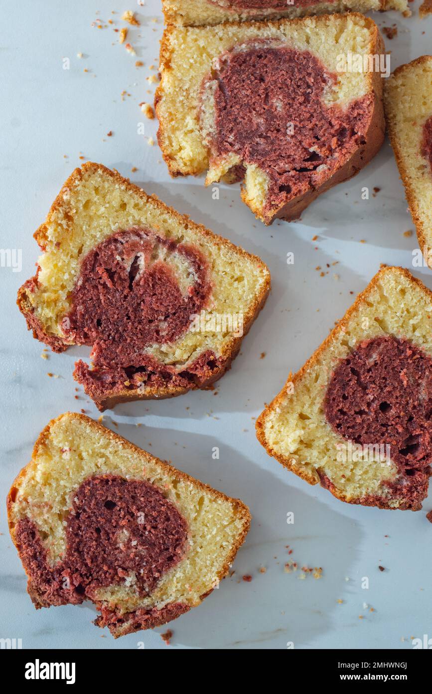 red velvet vanilla sponge cake on a table Stock Photo - Alamy