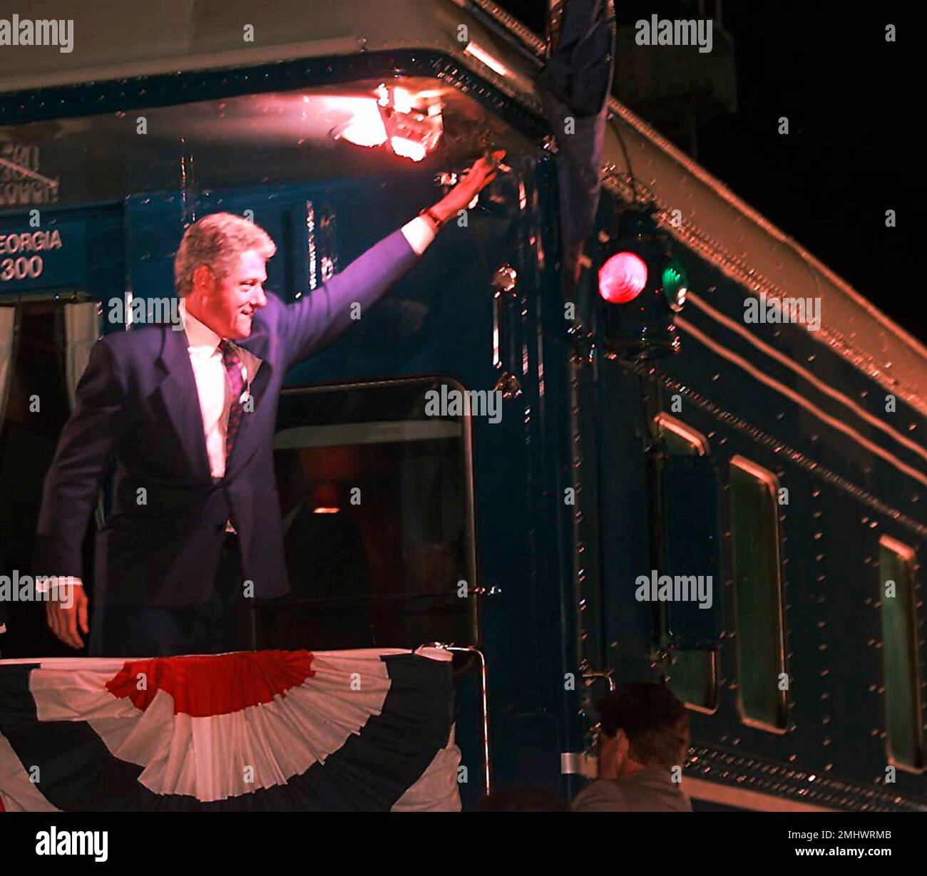 FILE - In this Aug. 25, 1996, file photo President Bill Clinton pulls ...
