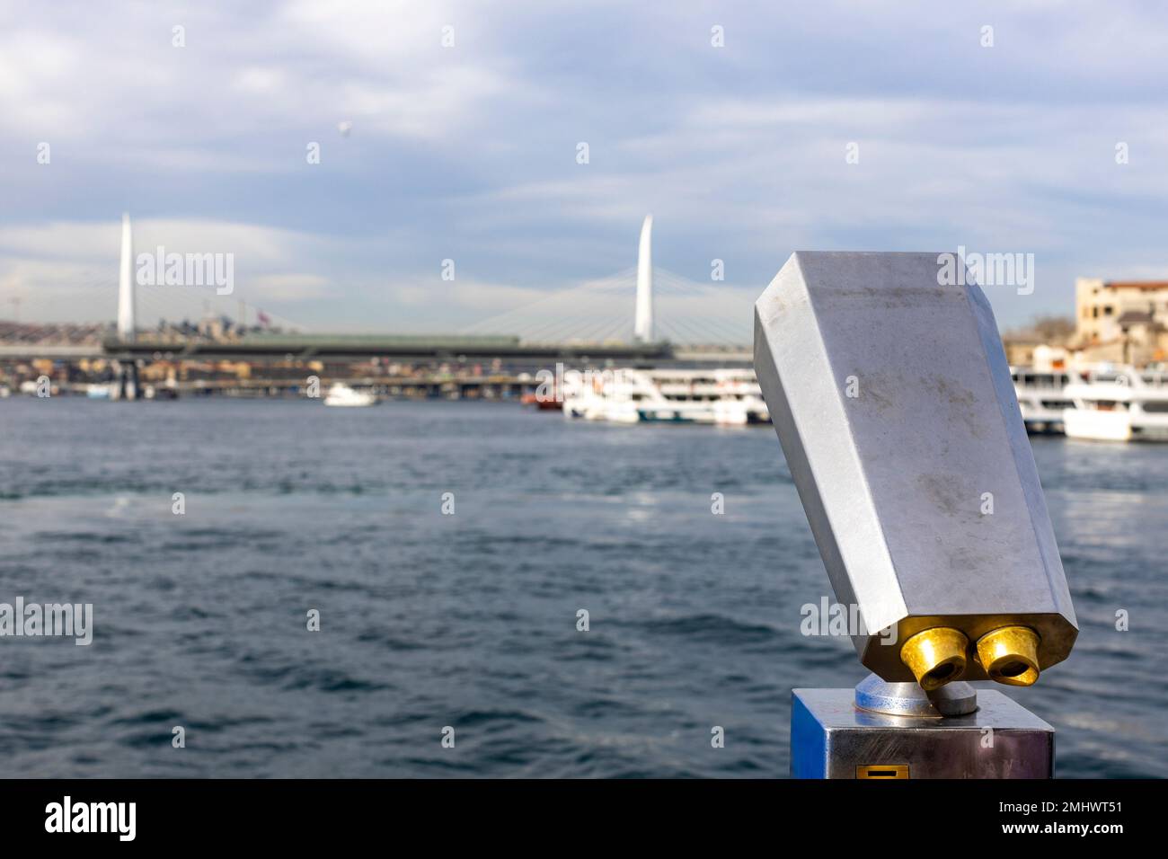 Tourist binoculars on the Galata Bridge in front of the Bosphorus ...