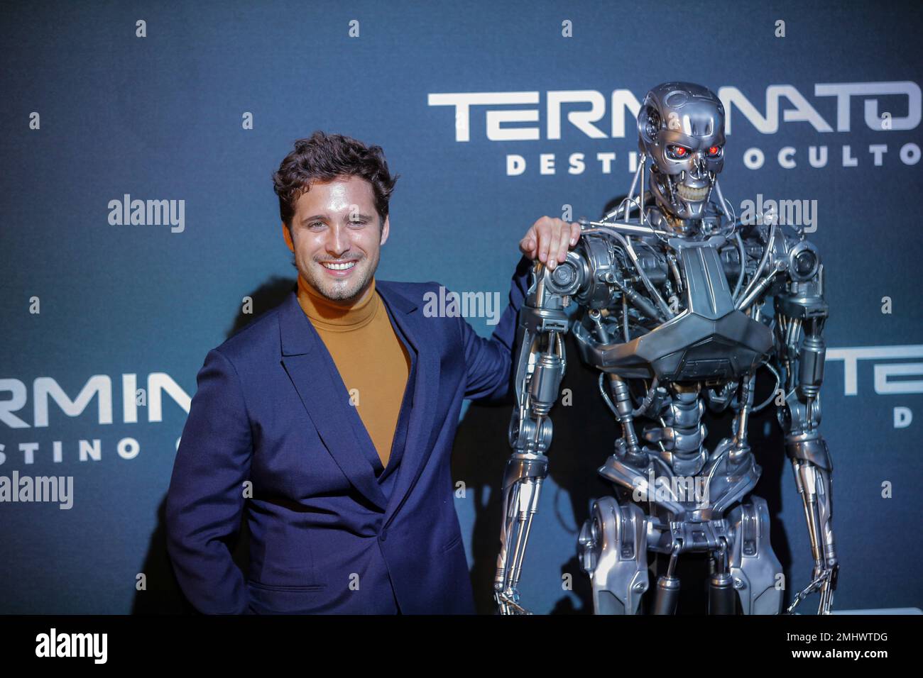 Mexican actor Diego Boneta poses next to a terminator statue during ...