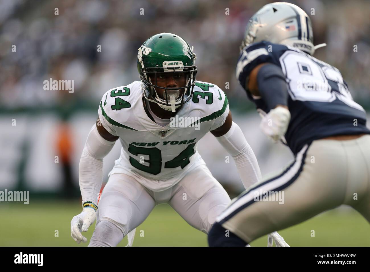 New York Jets cornerback Brian Poole (34) covers Dallas Cowboys wide ...