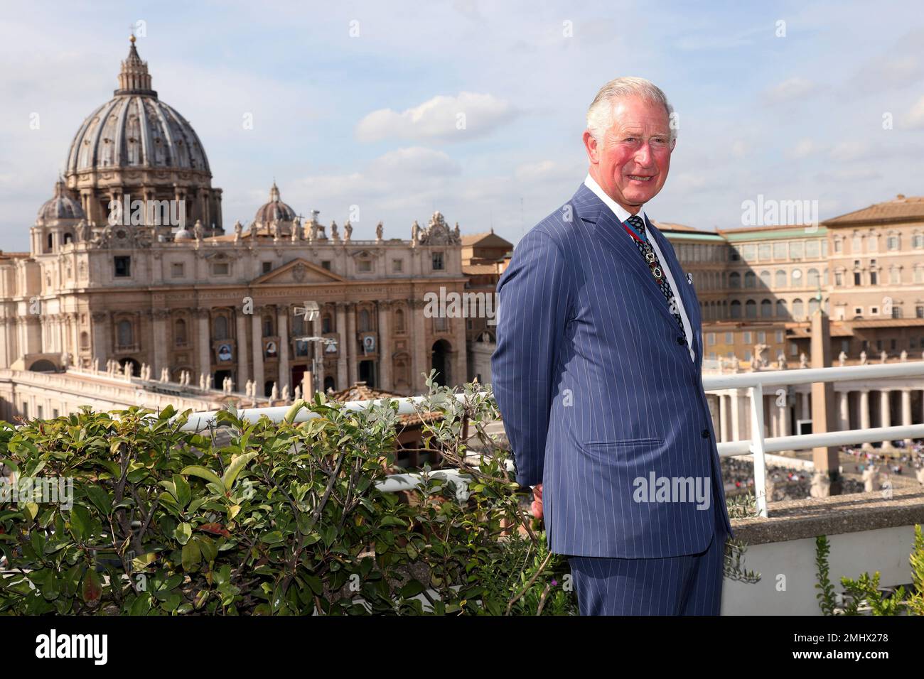 Britain's Prince Charles poses in front the St. Peter's Basilica during ...