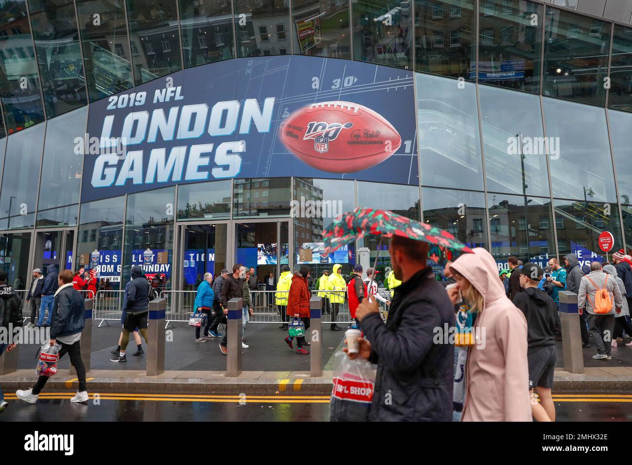 NFL football fans arrive at Tottenham Hotspur Stadium to watch an NFL ...