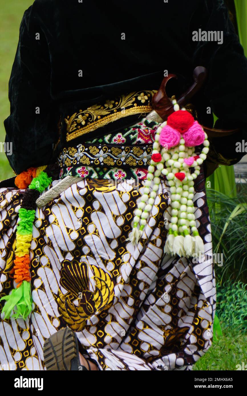 Keris on the back of Javanese. Keris is one of the Indonesian ...