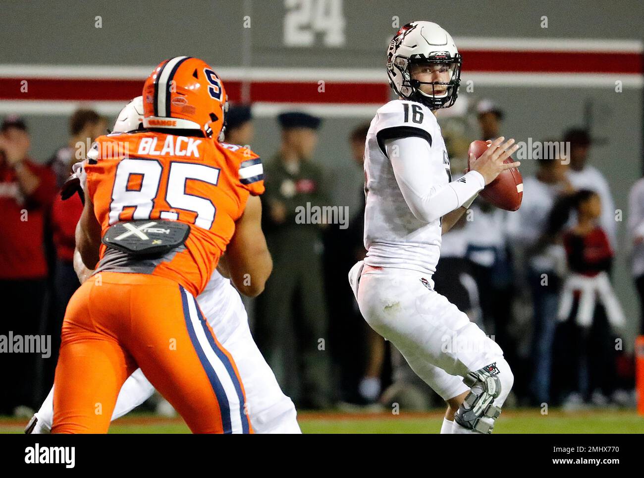 North Carolina State's Bailey Hockman (16) passes the ball as Syracuse ...