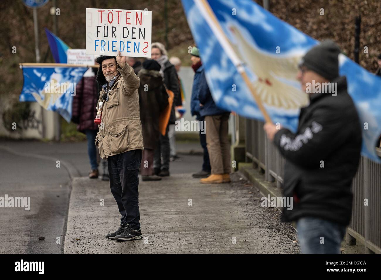 Kassel, Germany. 27th Jan, 2023. Demonstrators with flags and signs ...