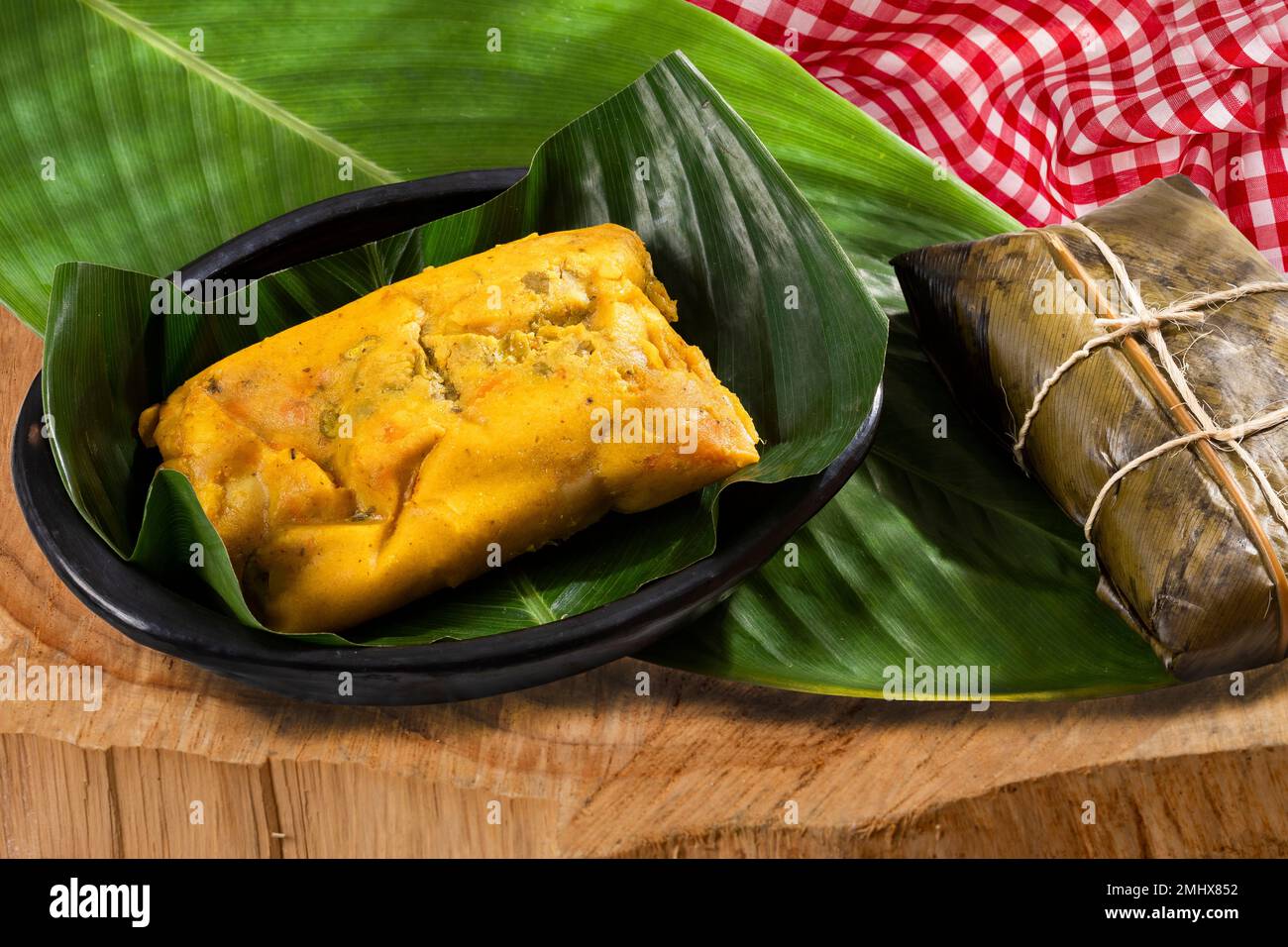 Tamale Typical Colombian Food Wrapped In Banana Leaves Stock Photo - Alamy