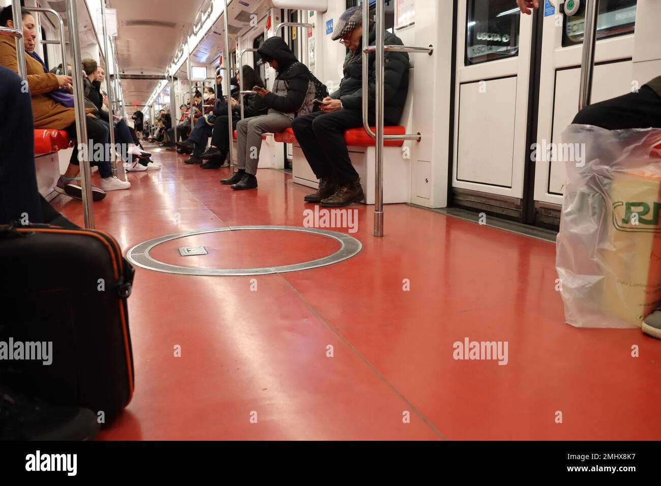 Passengers on Milan underground Stock Photo - Alamy