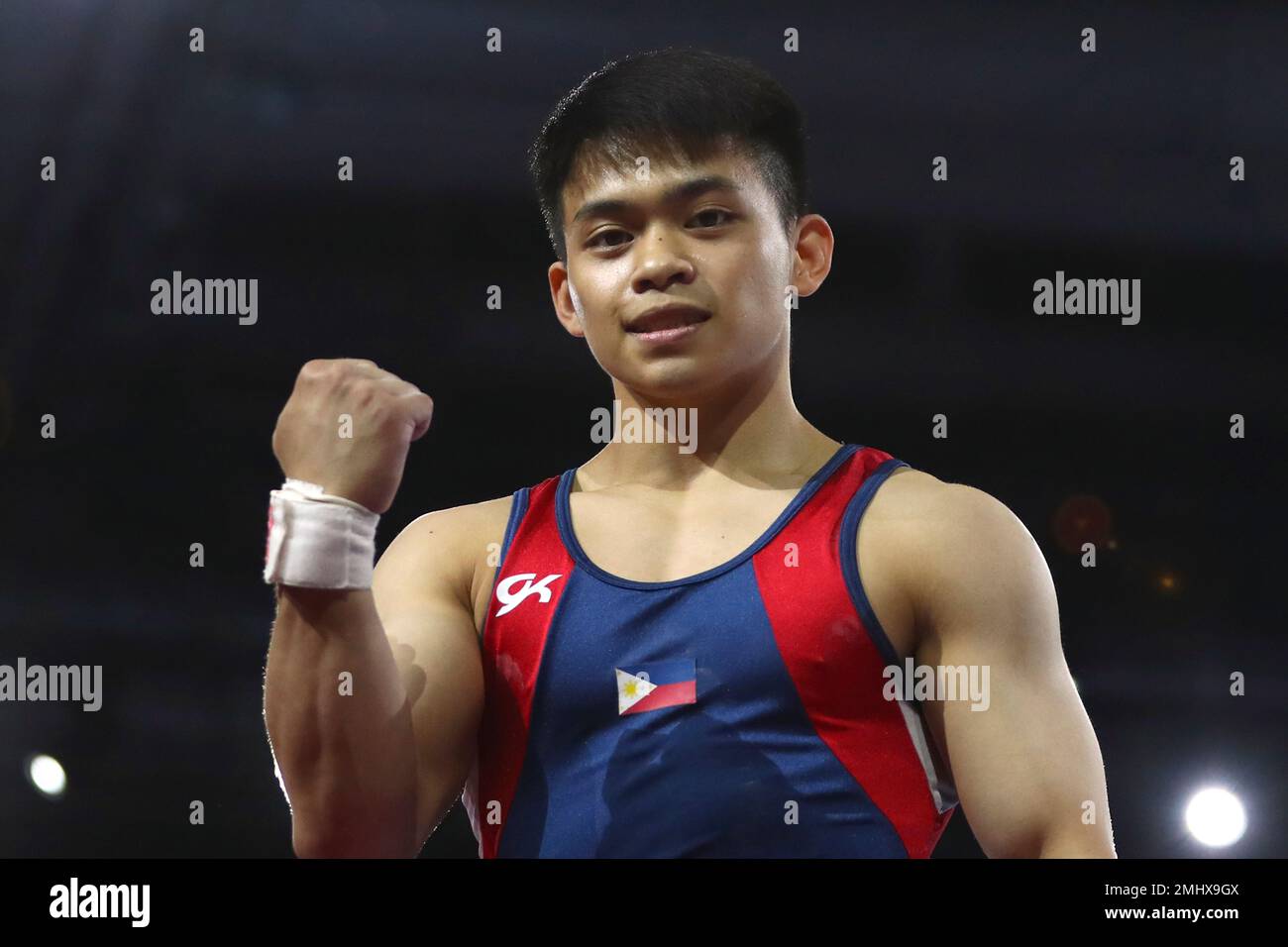 Gold medalist Carlos Edriel Yulo of the Philippines celebrates after ...