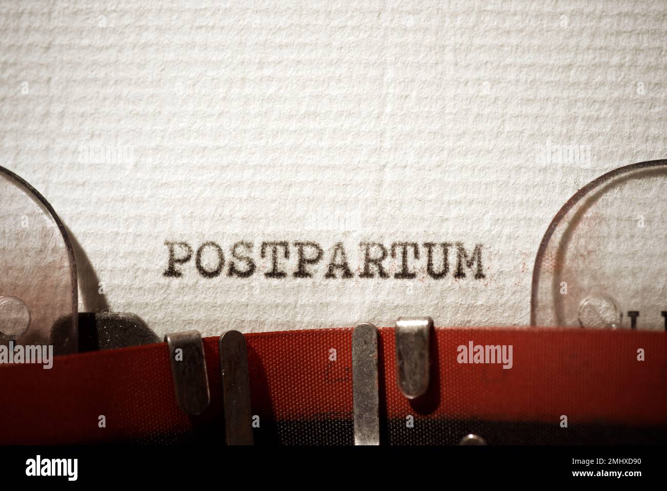 Postpartum word written with a typewriter Stock Photo - Alamy