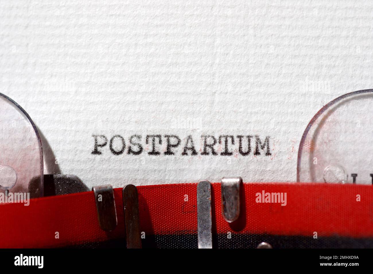 Postpartum word written with a typewriter Stock Photo - Alamy