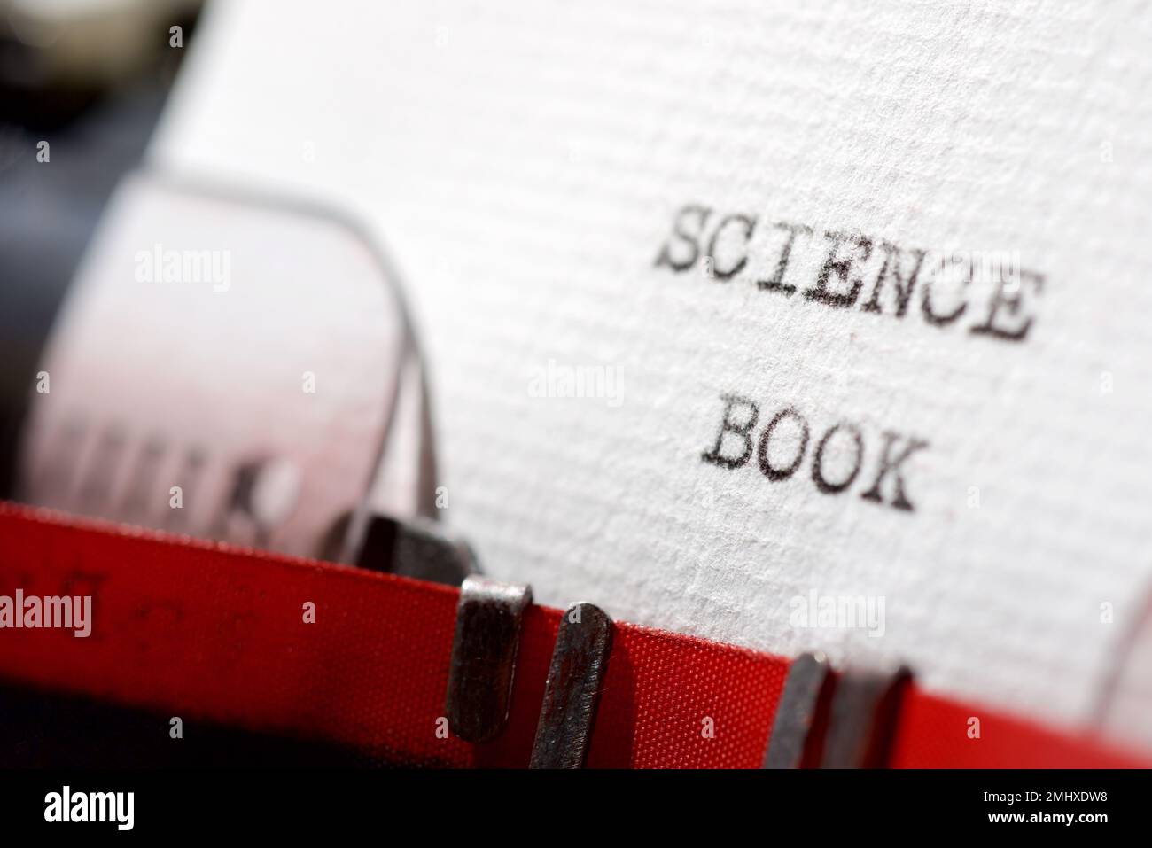 Science book text written with a typewriter Stock Photo - Alamy