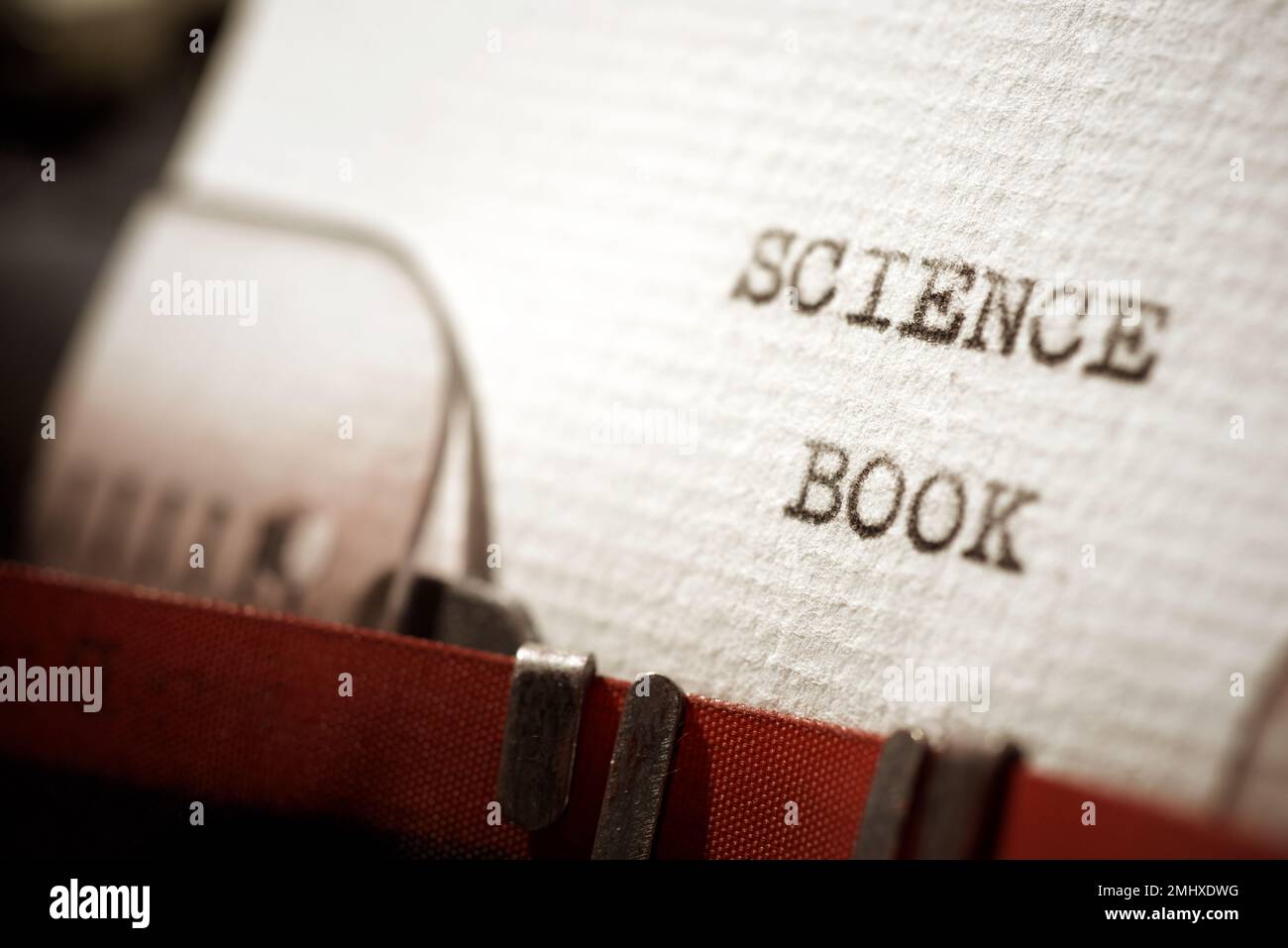 Science book text written with a typewriter Stock Photo - Alamy
